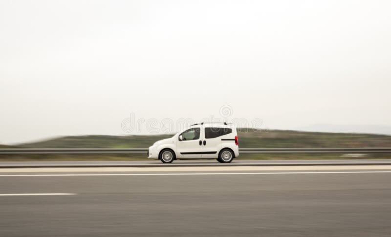 White minivan on highway stock image. Image of freight - 179865691