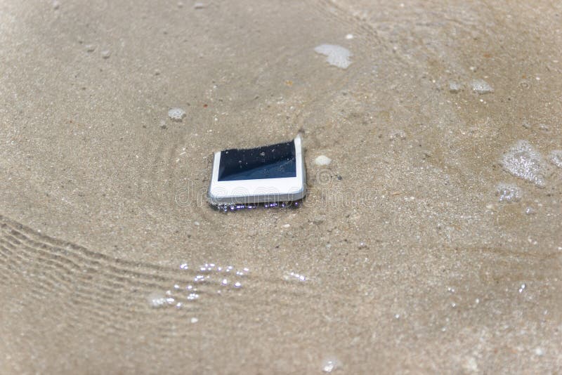 White Mobile Phone Floated To the Sea Stock Image - Image of ocean ...