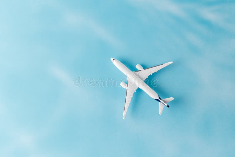 White Model Airplane on Blue Background. Travel Concept Stock Image ...