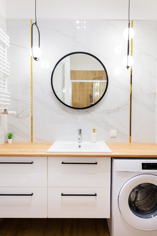 White Modern Bathroom Vanity with Washing Machine and Mirror Stock ...