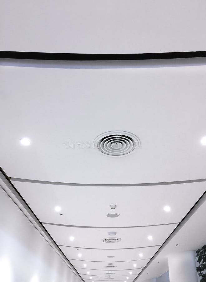 White Modern Ceiling with Conditioned Air Diffusers Stock Image - Image ...
