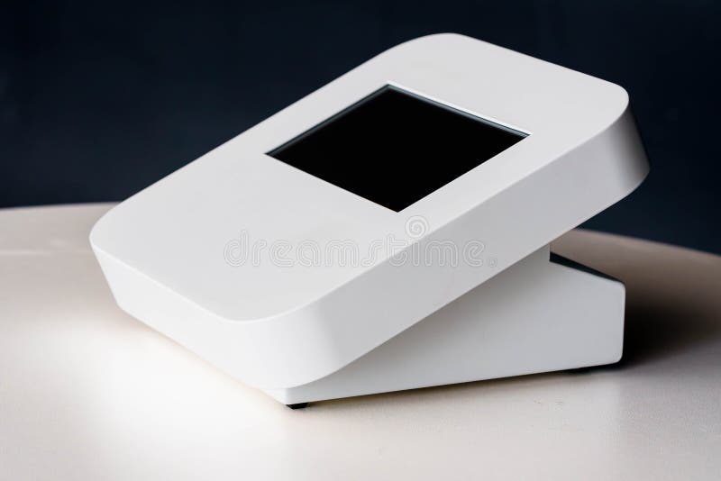 White Modern Digital Device with Blank Screen Resting on Table Stock ...