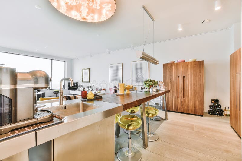 White Modern Kitchen with Chrome Appliances Stock Image - Image of ...