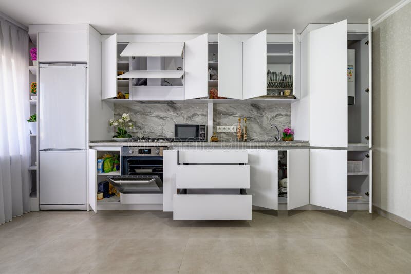 White Modern Kitchen Interior, Some Drawers Pulled Out Stock Image ...