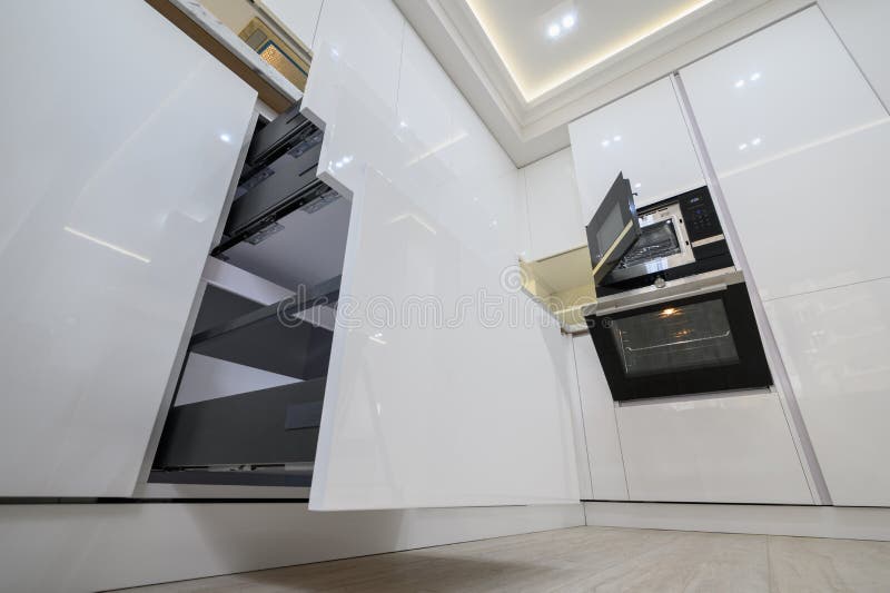 White Modern Kitchen Shot with High Angle of View, Drawers Pulled Out ...