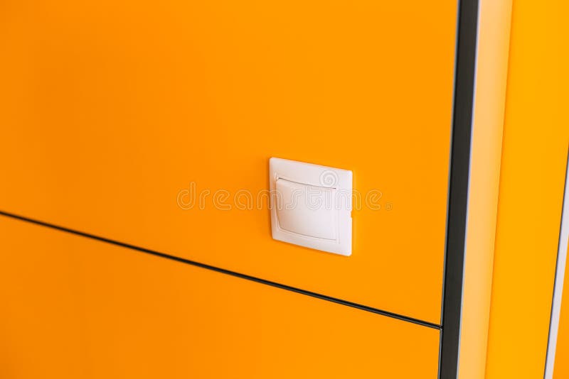 White Modern Light Switch on a Yellow Wall Stock Photo - Image of ...