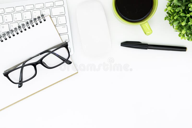 White Modern Office Desk Table with a Lot of Things on it. Top View ...