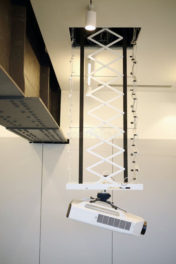 White Modern Projector for Presentation Hangs from Stock Image - Image ...