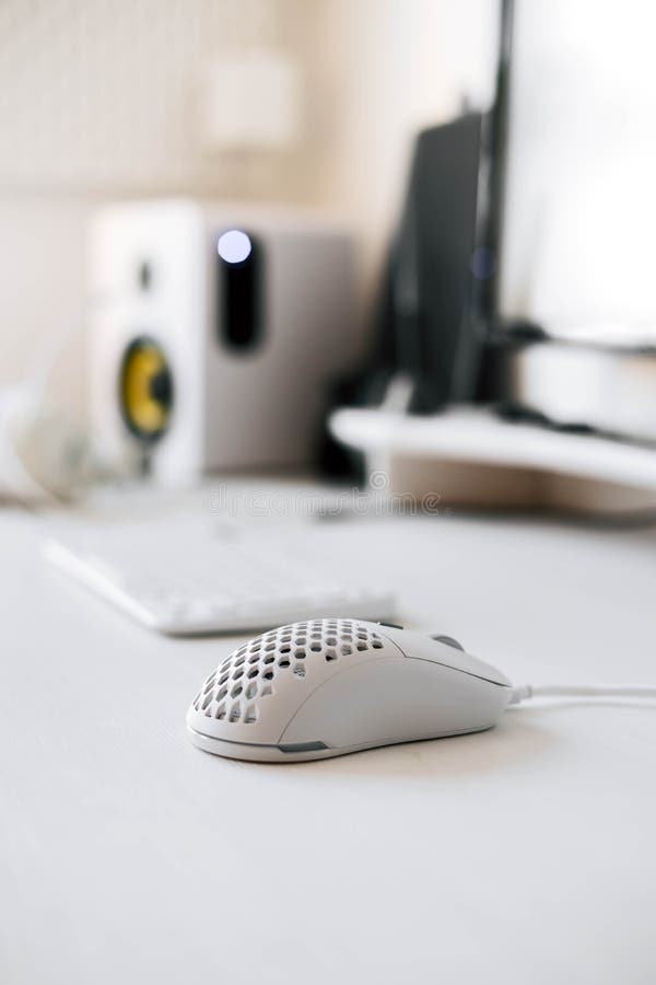 White Modern Wired Gaming Mouse in a White Comfortable Gamer Workspace ...