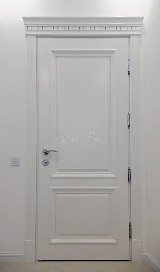 White Modern Wooden Door. Interior Door on a White Wall. Stock Photo ...