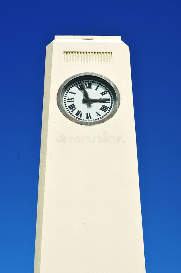 White monument with clock stock image. Image of stone - 46775335