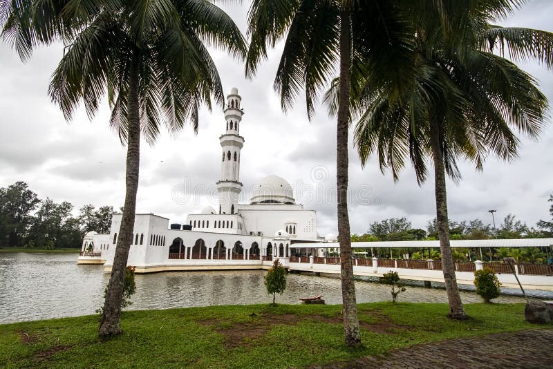 White Mosque on a lake stock photo. Image of arabic - 242071620