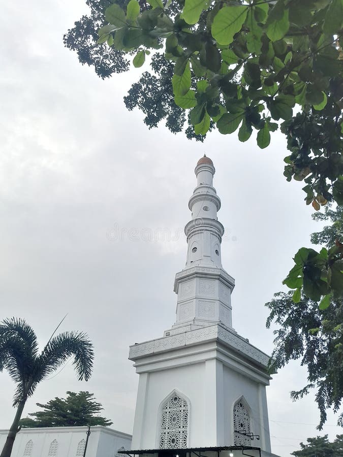 The White Mosque Tower with the Tree beside it Stock Photo - Image of ...