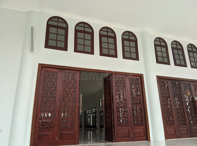 A White Mosque with Unique and Magnificent Carved Doors and Windows ...