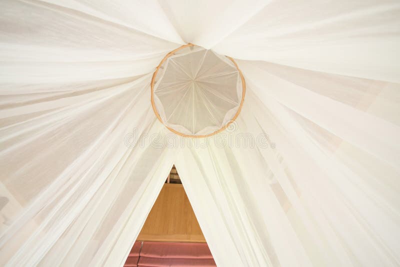 White Mosquito Net Over a Bed in a Luxurious Hotel Stock Image - Image ...
