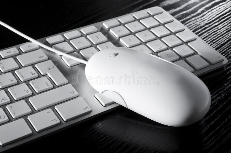 The White Mouse and the Keyboard Stock Photo - Image of business ...