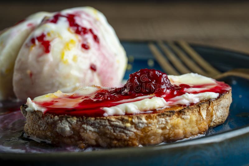 White Mozzarella Cheese Served with Raspberry Jam and a Slice of Whole ...