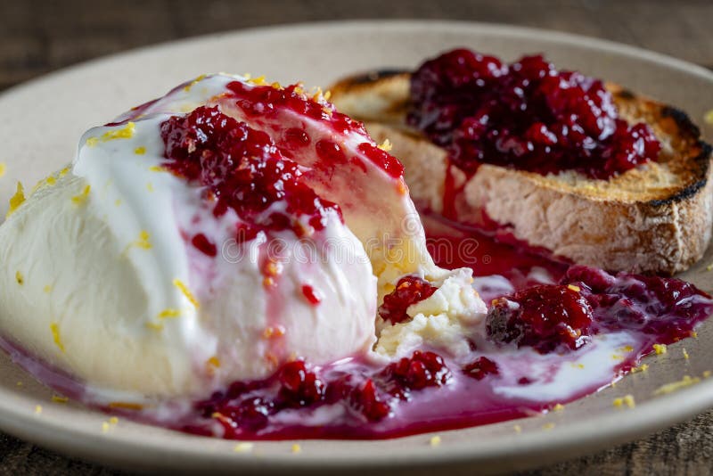 White Mozzarella Cheese Served with Raspberry Jam and a Slice of Whole ...