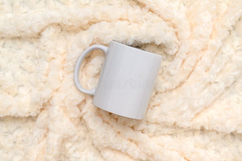 White Mug on White Fur Texture. Dishes for Tea and Coffee. View from ...