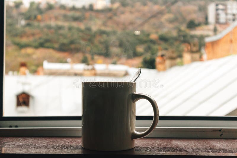 White Mug of Hot Coffee on the Edge of Windows Stock Photo - Image of ...