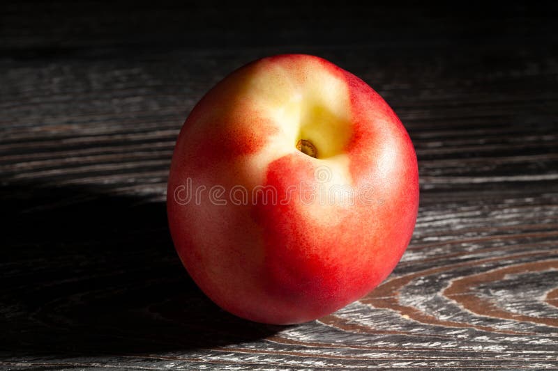 White Nectarine on Black Wood Stock Image - Image of peaches, black ...