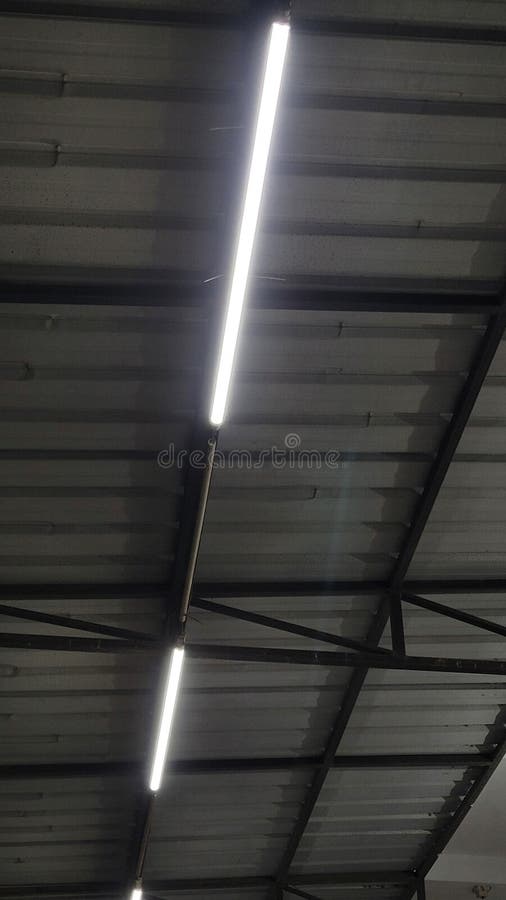 White Neon Lights Formation Under Light Steel Roof Stock Image - Image ...