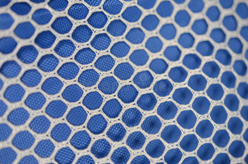 White Net on Blue Plastic Rubber Surface Stock Photo - Image of ...