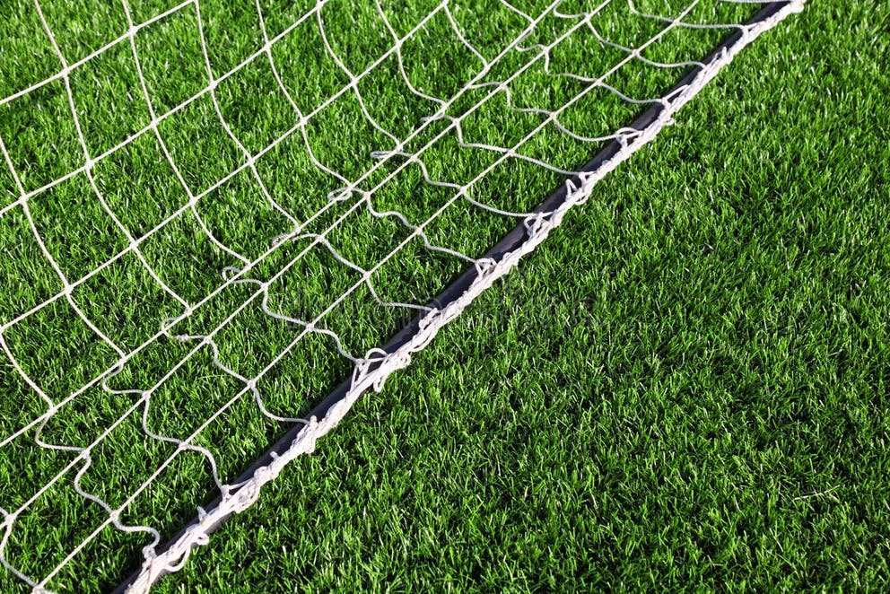 White Net for Football Lying on Grass Stock Photo - Image of green ...