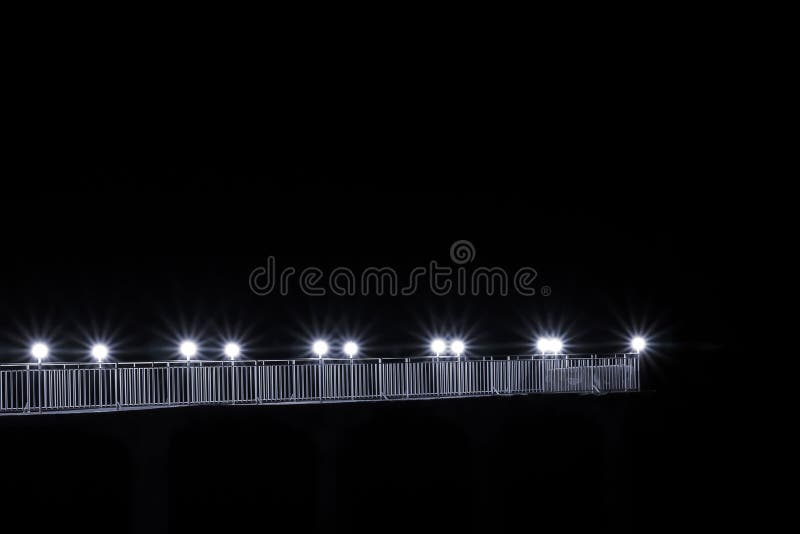 White Night Bridge with Lights with Light. Rays of White Light from the ...