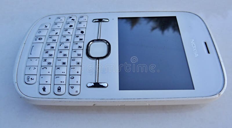 White Nokia Asha 302 Mobile Phone Showing Keyboard and Screen Editorial ...