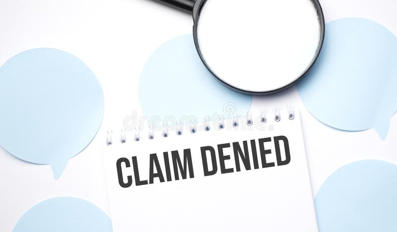 White Noteapad and Magnifier on Blue Speech Bubles. Text Claim Denied ...