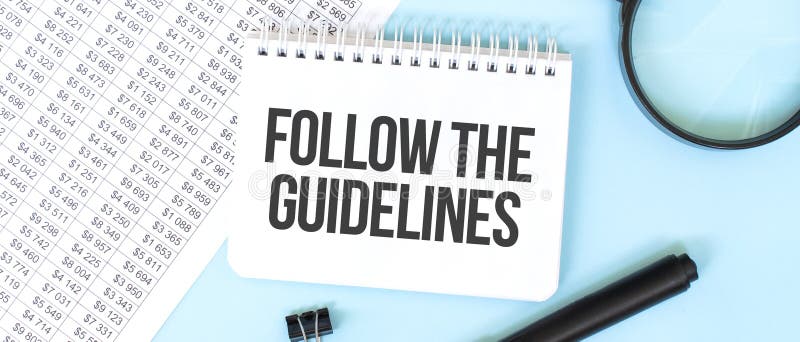 White Noteapad and Magnifier on the Financial Documentation. Text ...