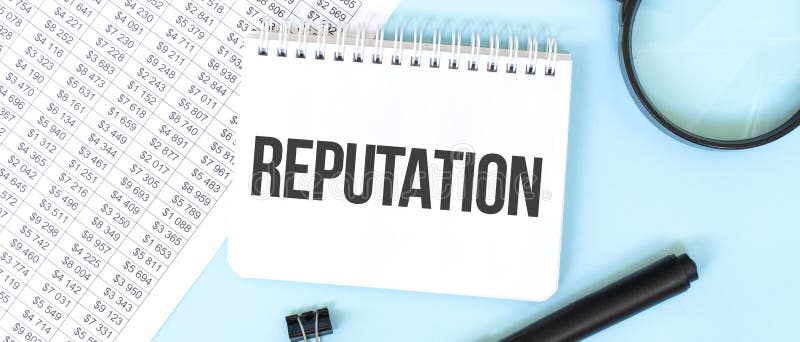 White Noteapad and Magnifier on the Financial Documentation. Text ...