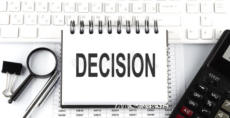 White Notebook with Text DECISION on White Keyboard with Calculator ...