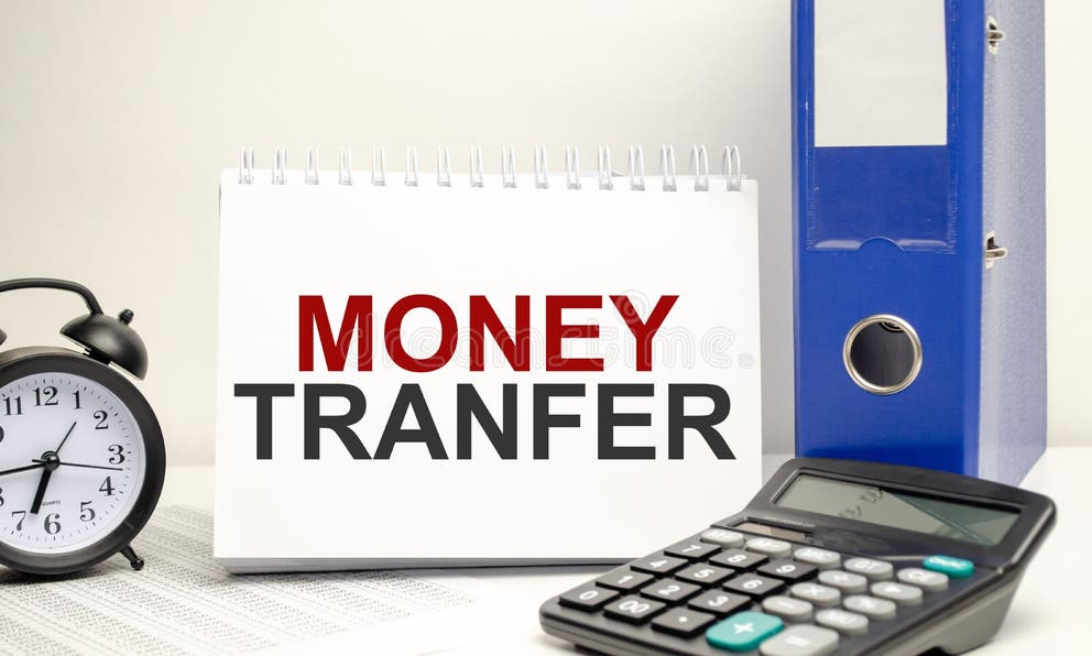 White Notebook with the Text Money Transfer with Calculator and Paper ...