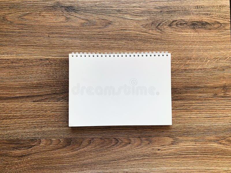 White Notebook Top View on Wooden Table Stock Image - Image of small ...