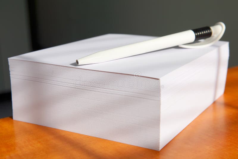 White notepad with a pen stock image. Image of paper - 18052453