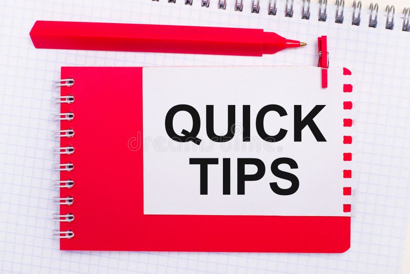 On a White Notepad, a Red Pen, a Red Notepad and a White Sheet of Paper ...