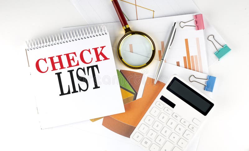 White Notepad Text CHECK LIST with Diagram,chart,calculator on the ...