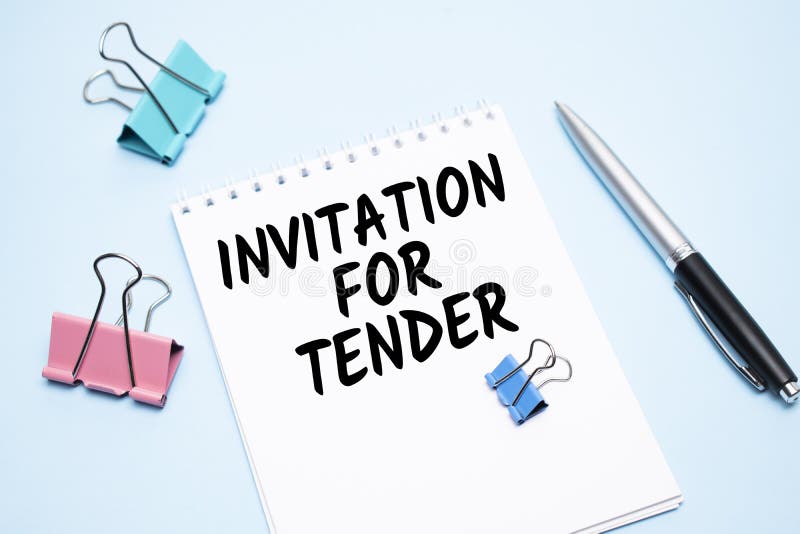 White Notepad with Text INVITATION for TENDER and Office Tools on the ...