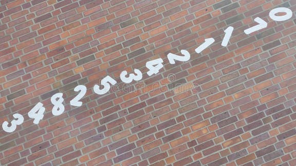 White Numbers on Brick Wall Stock Photo - Image of white, mathematics ...