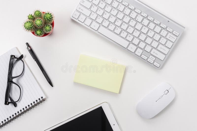 White Office Desk Table with Blank Notebook, Computer Keyboard and ...