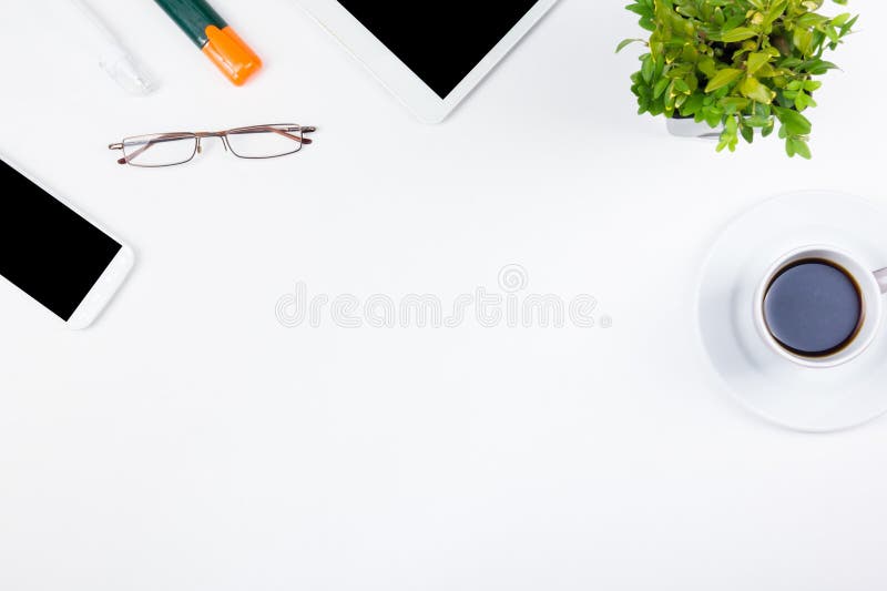 White Office Desk Table with Computer, Pen and a Cup of Coffee, Lot of ...