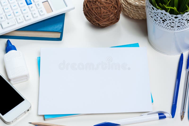 White Office Desk Table with a Lot of Things on it Stock Photo - Image ...