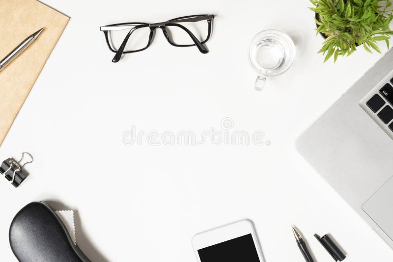 White Office Desk Table with a Lot of Things on it. Top View with Copy ...