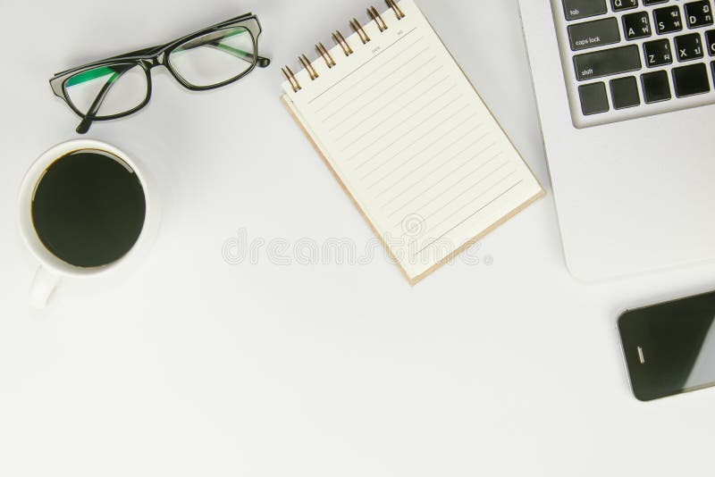 White Office Desk Table with a Lot of Things on it. Top View Wit Stock ...