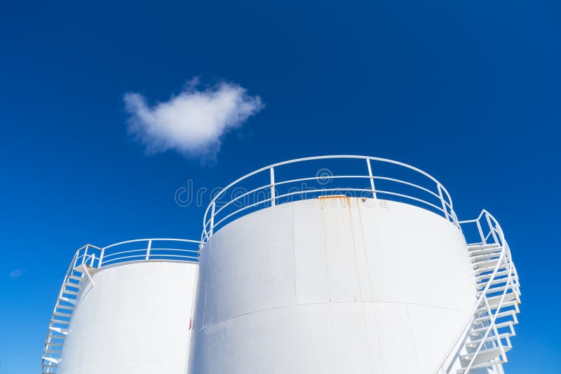 White Oil Tank, Blue Sky & Cloud, Iceland Stock Image - Image of ...