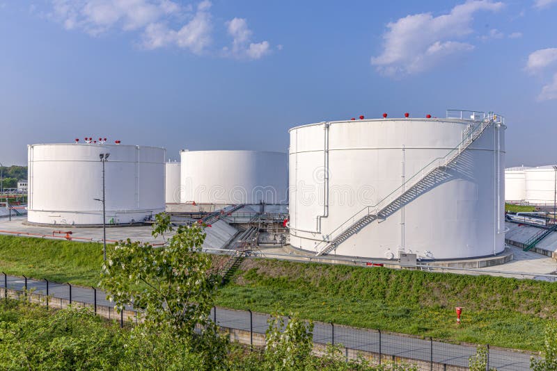 White oil tanks stock photo. Image of silo, explosive - 245137334