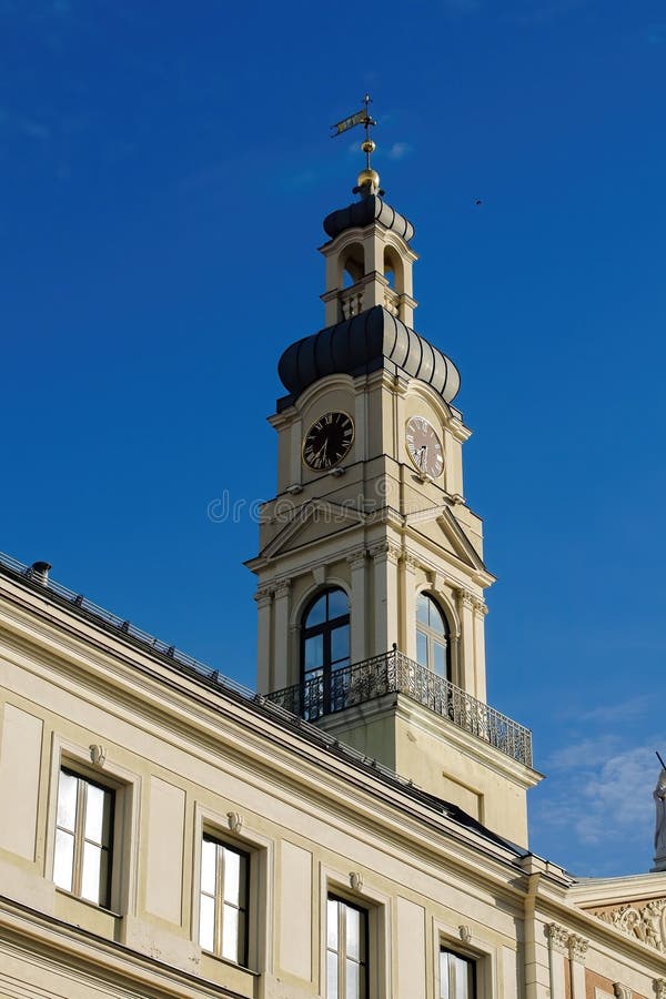 White Old Clock Tower in the Gothic Style, Riga. Stock Photo - Image of ...