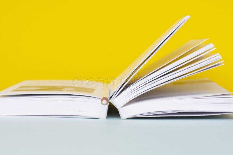 A Open Book on a Yellow-blue Background. the Concept of Education Stock ...